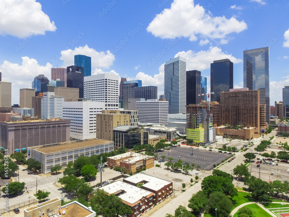 Aerial view Houston downtown against cloud blue sky with empty parking ...