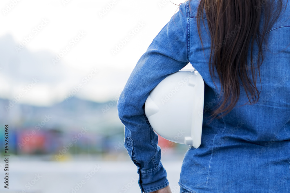 Professional Woman Engineer Holding White Helmet, Standing at ...