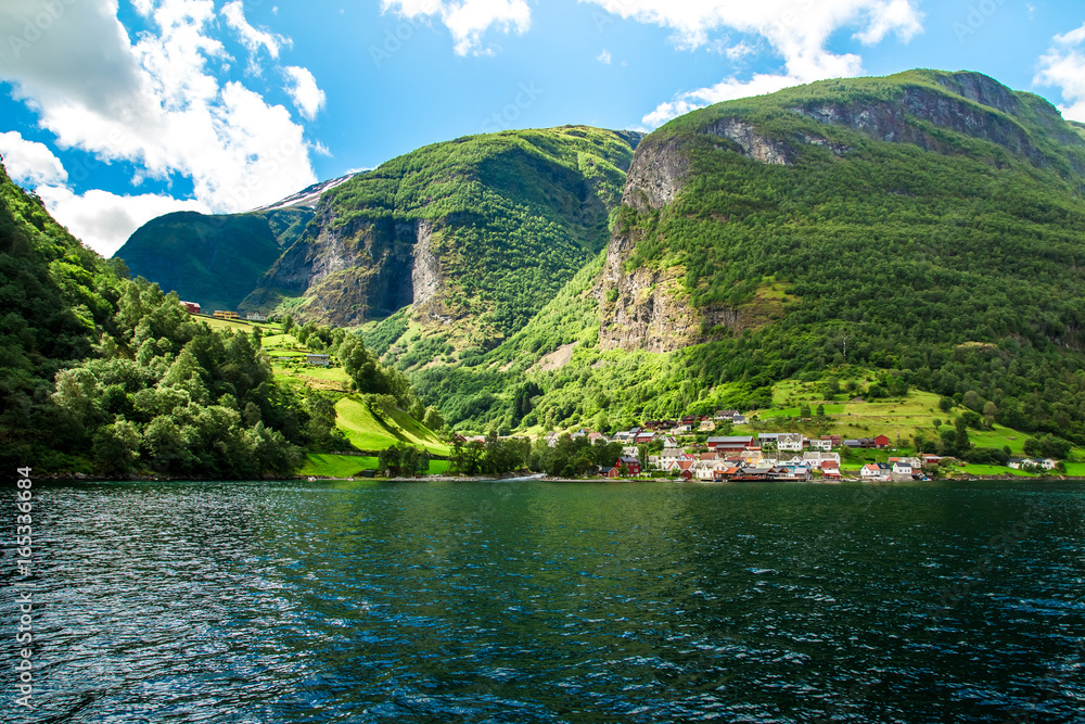 Small village with a lovely backdrop at Flam Fjords, Norway. Mountains ...