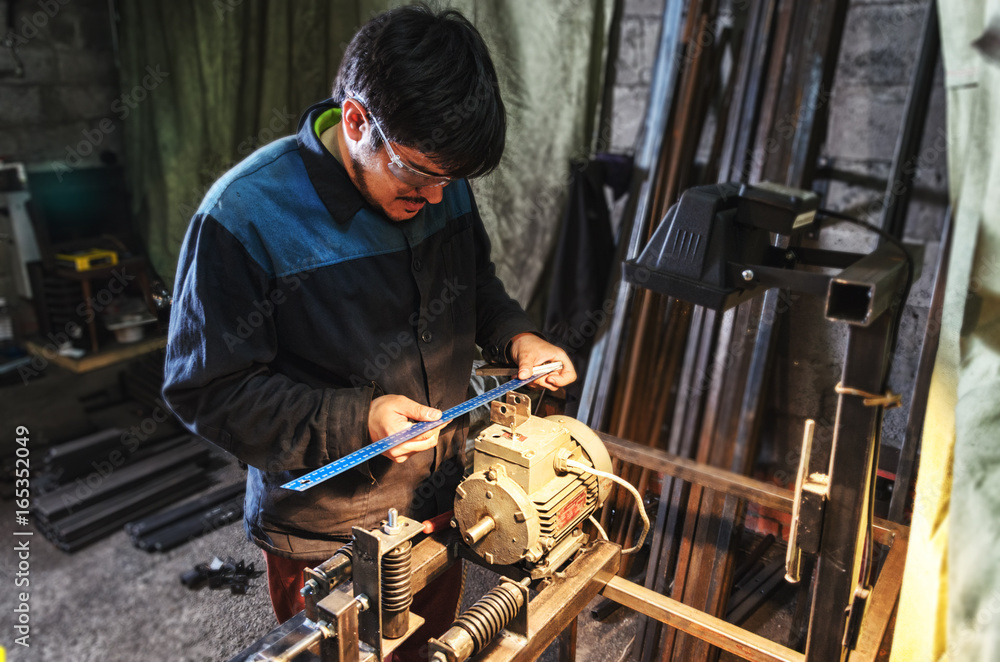 Measures the dimensions of a structure Stock Photo | Adobe Stock