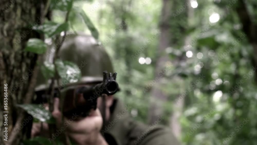 Korean War Action Footage - American Soldier scans the jungle with his ...