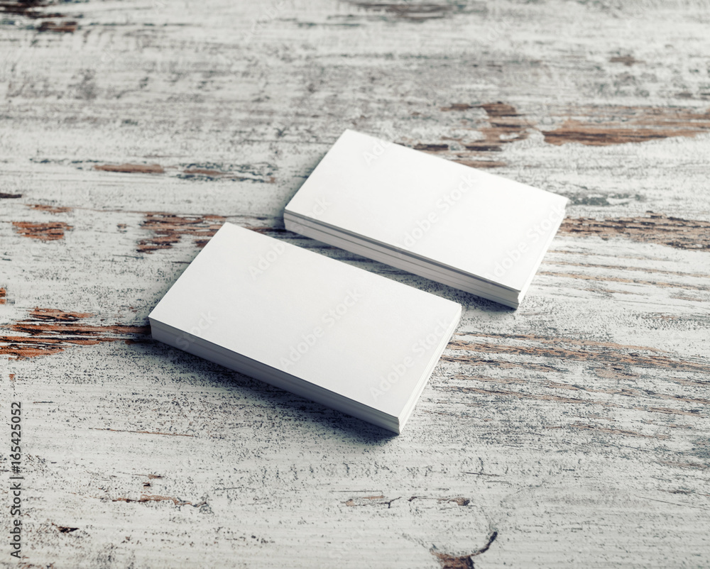 Blank business cards on light wood background. Template for ID. Mock up ...