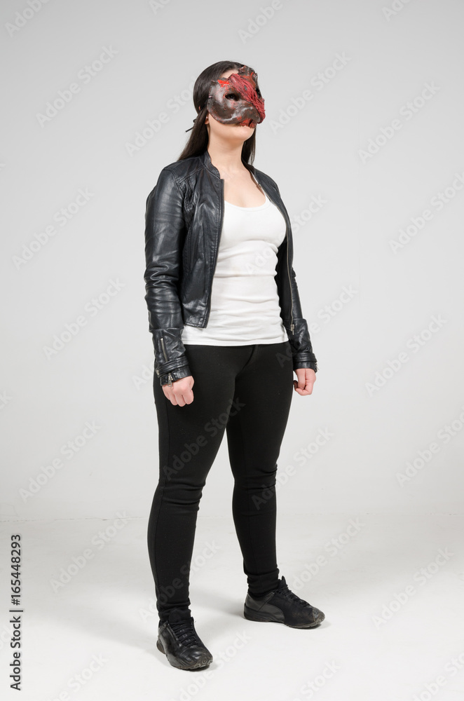 A woman with a red scary horror mask against a white infinity curve ...