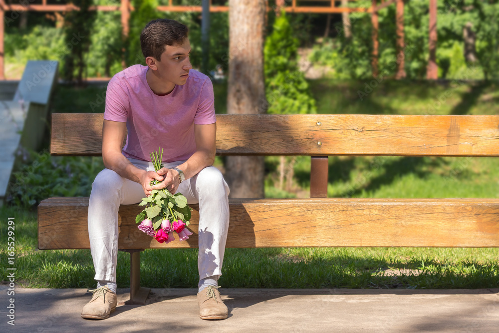 Person Waiting On A Bench