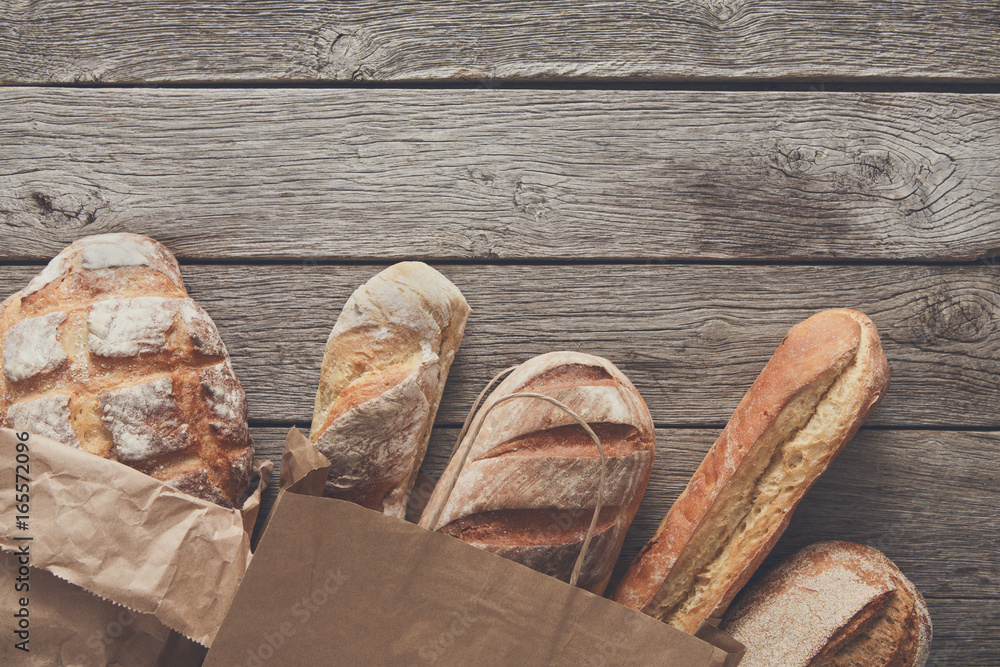 Bread bakery background. Brown and white wheat grain loaves comp Stock ...