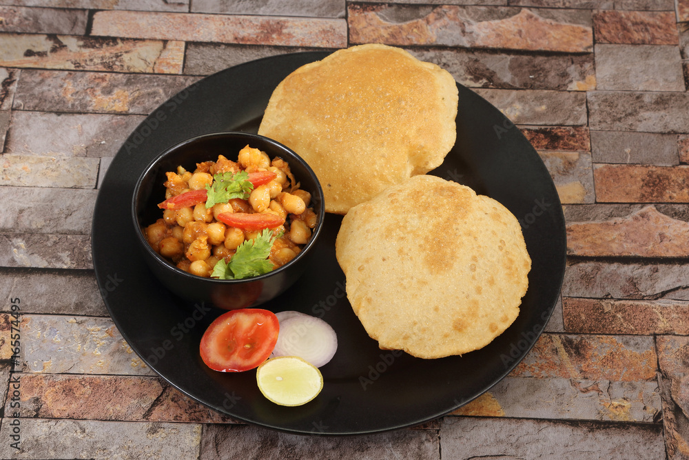 Chole with puri or Chana Masala with Puri Indian Food Stock Photo ...