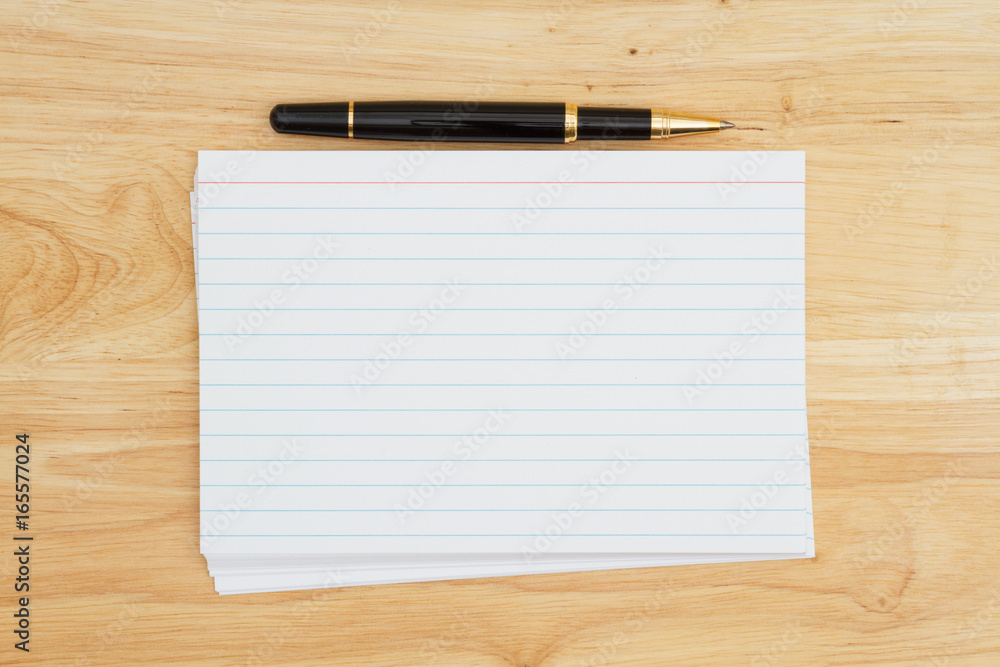 Stack of blank white index cards on wood desk with a pen Stock Photo ...
