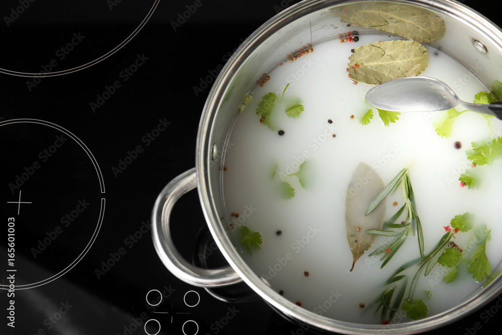 Cooking pot with flavored brine for turkey on stove Stock Photo | Adobe ...