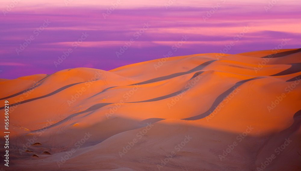 Beautiful sunset over sand dunes abstract background. Sahara desert in ...