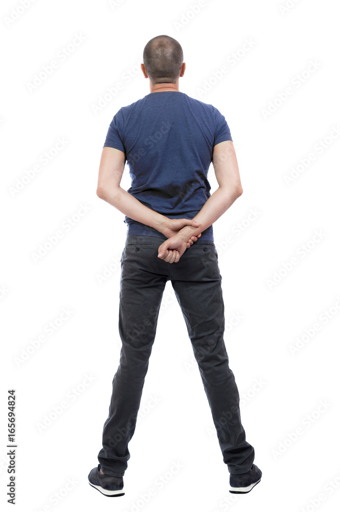 Back view of man in trousers. Standing young guy. Rear view people ...