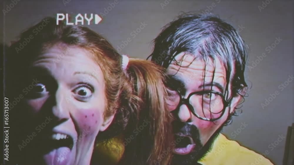Fake VHS tape: a weird presenter and his female assistant doing a peek ...