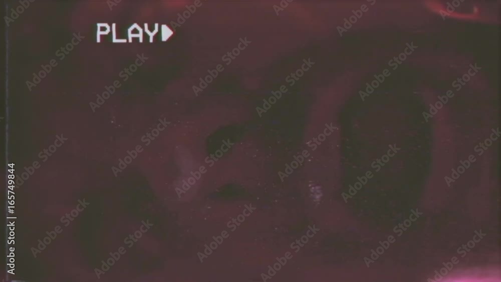 Fake VHS tape: a scary threatening zombie putting his face on a glass ...