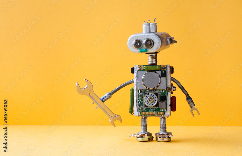 Hand wrench robot serviceman worker on yellow background. Cyborg toy ... Hand wrench robot serviceman worker on yellow background. Cyborg toy ...