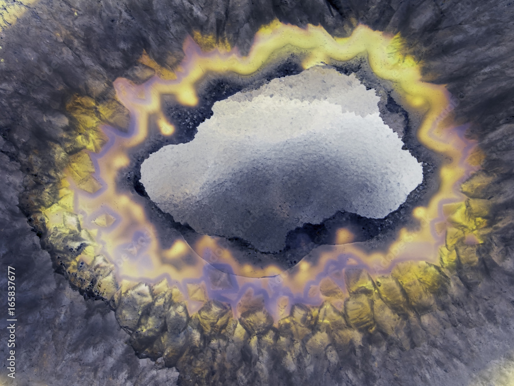 closeup macro of the cross section of a geode and internal crystalline ...