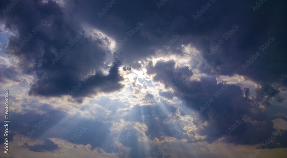 Gods light. Rays of light through dark clouds. sun shines from cloud ...