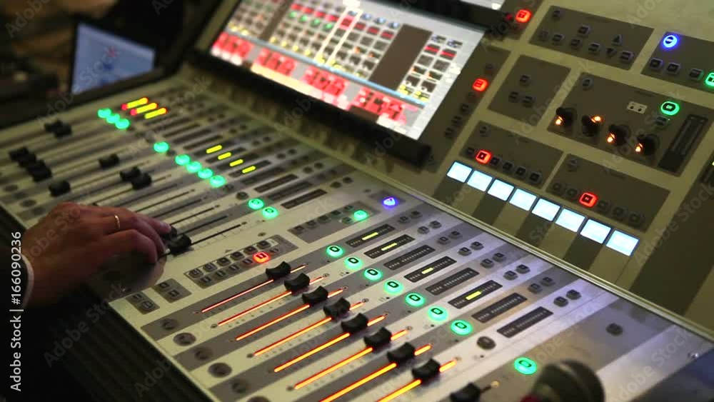 Professional audio console in a concert, sound mixer console during a ...