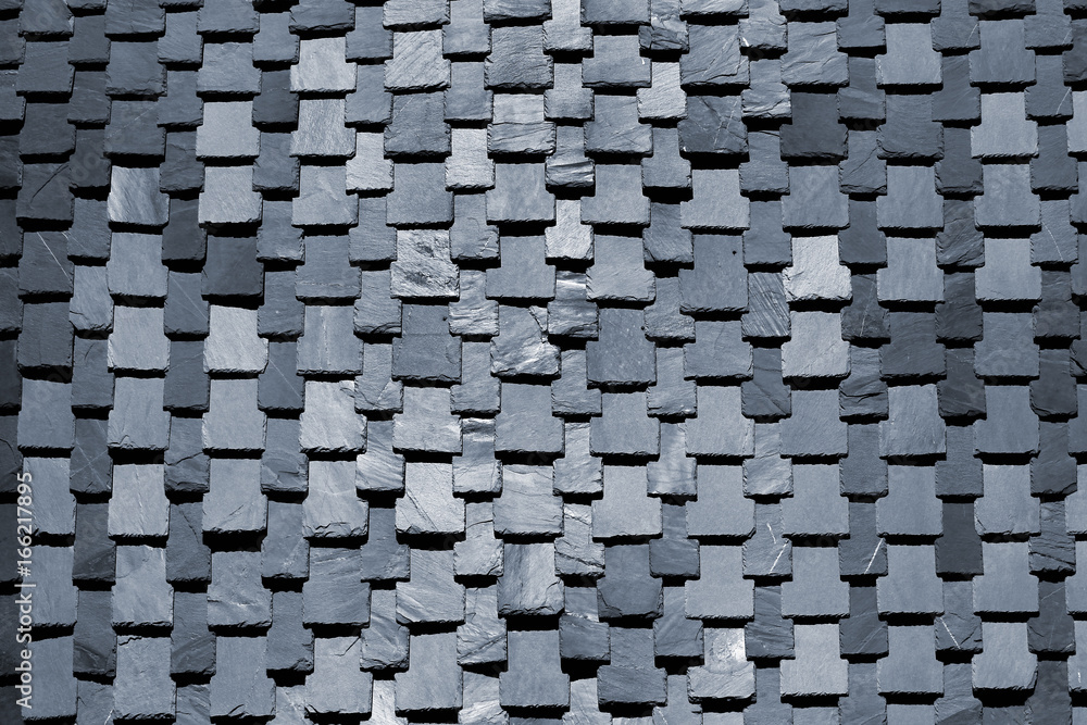 Overlapping stone slabs on a roof. Tiled shingles background Stock ...