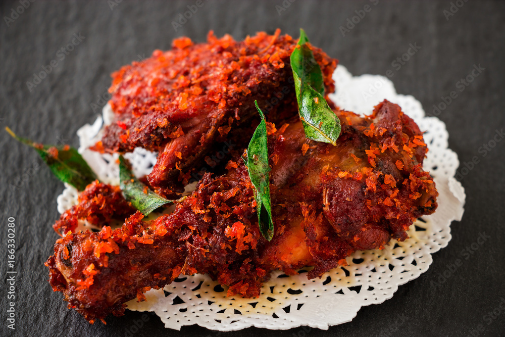 Authentic Indian Chicken fry with spices, curry leaf and coconut ...