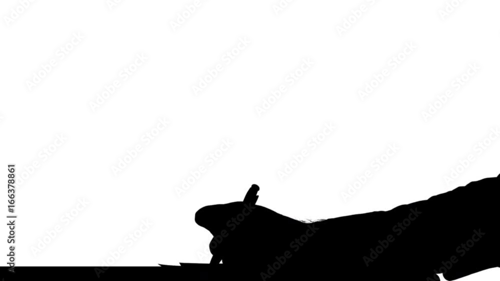 Writing on paper Male hands put sheets of paper on a table, with one ...