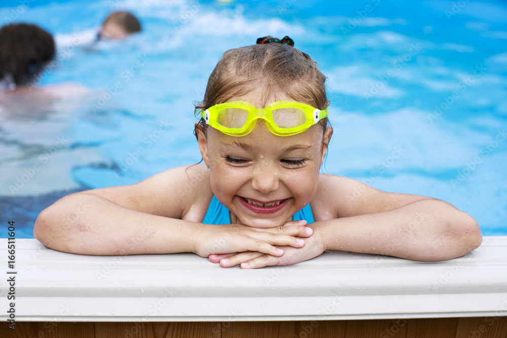 Happy little Girl in bikini swimming pool Stock Photo | Adobe Stock