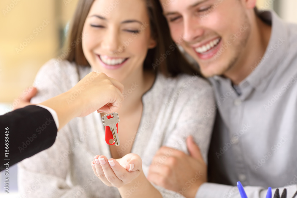 Homeowners receiving their new house keys Stock Photo | Adobe Stock