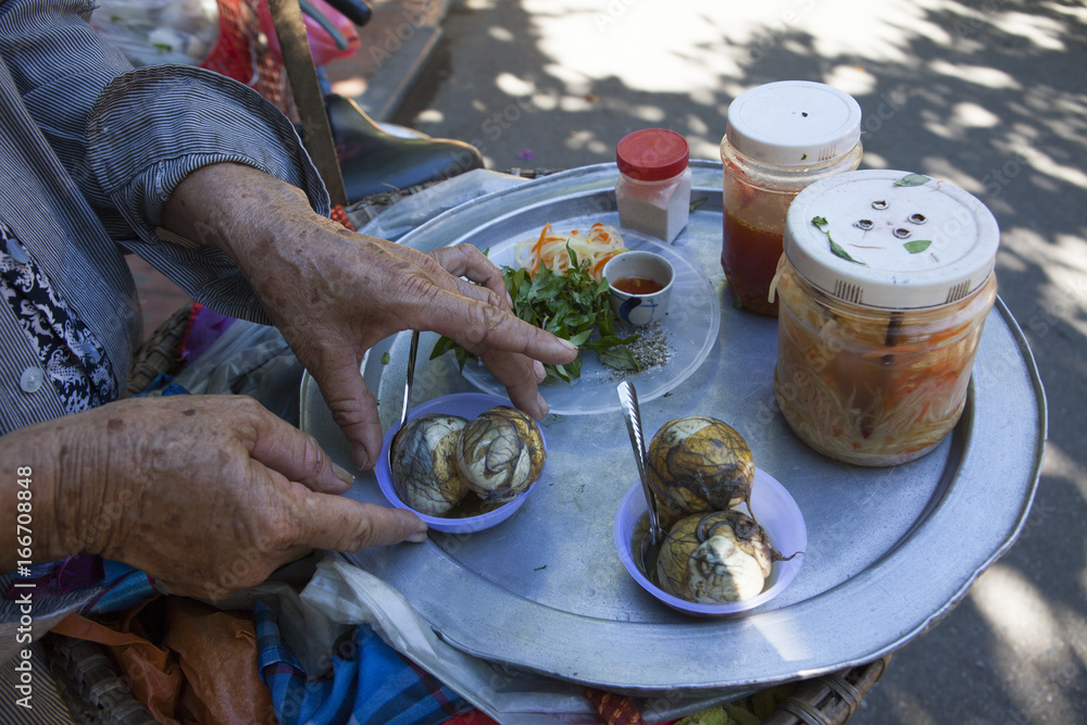 Balut (boiled developing duck embryo) in Hoi An, Vietnam. This is a ...