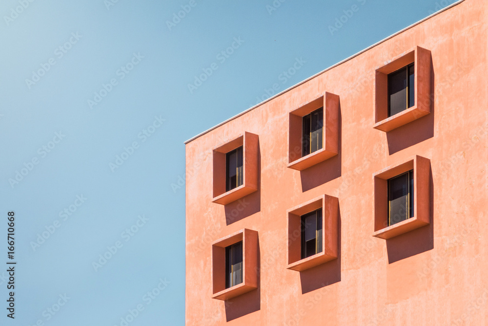 Modern orange office building Photos | Adobe Stock
