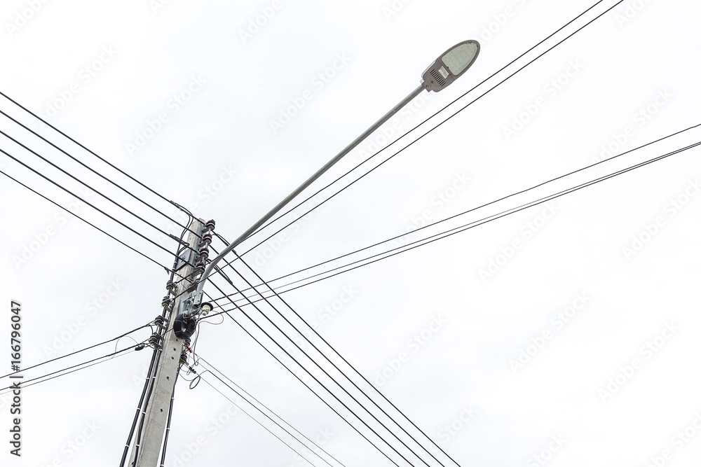 Lamp post and Electric pole connect to the high voltage electric wires ...