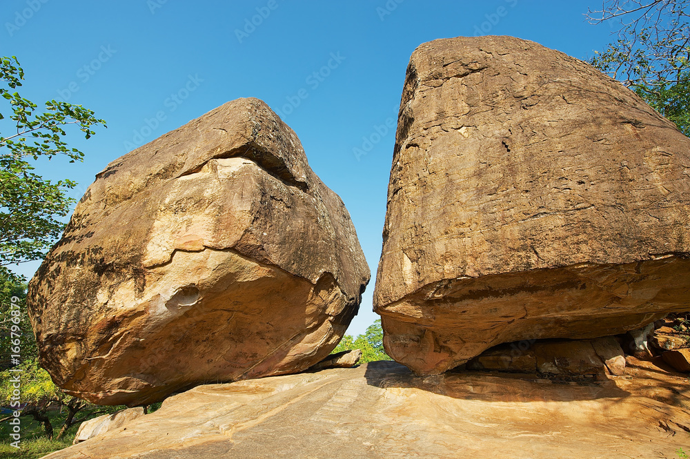 Ancient monks meditation caves under big rocks in Anuradhapura, Sri ...
