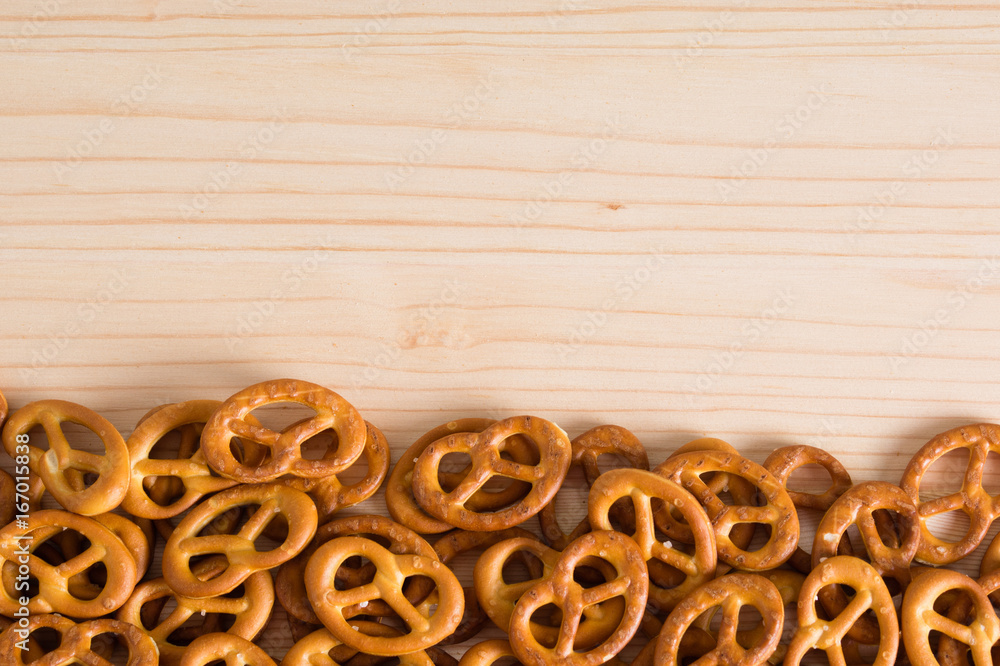 Background texture of salted savory mini pretzels in the traditional ...