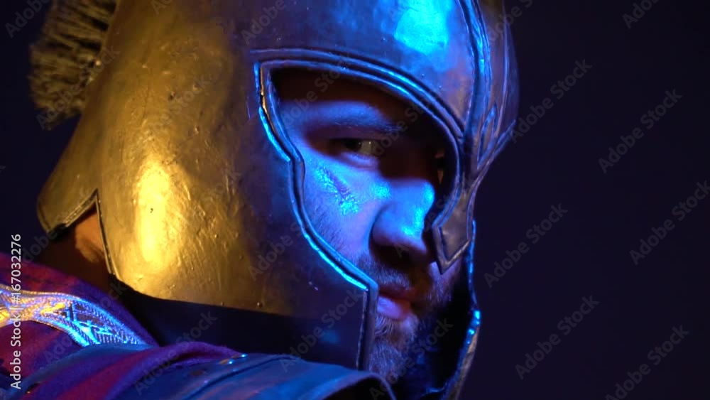 Wideo Stock: Unshaven Roman gladiator with a scar on his face in a ...