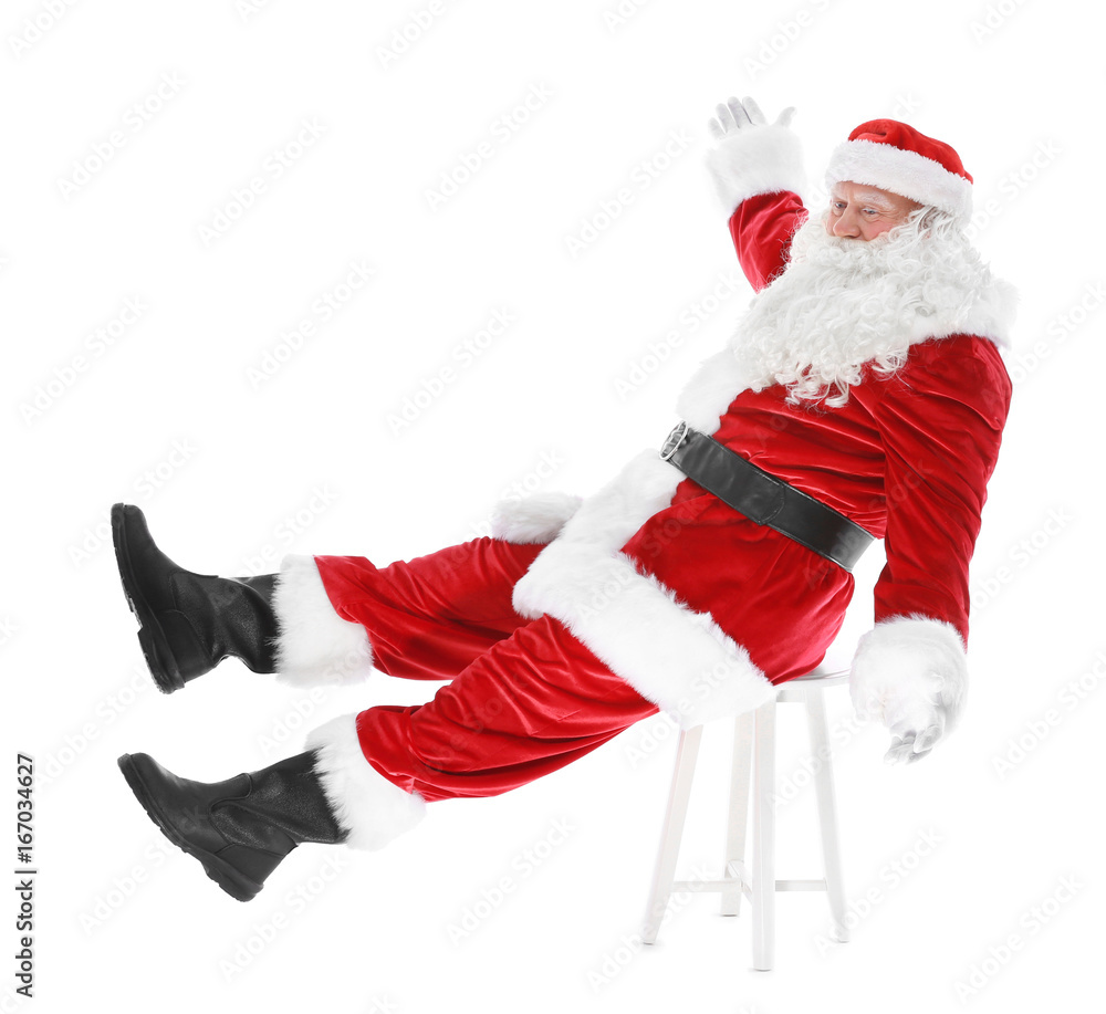 Authentic Santa Claus sitting on chair against white background Stock ...