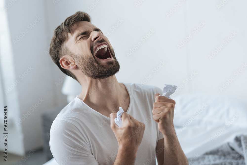 Desperate devastated man having a nervous breakdown Stock Photo | Adobe ...
