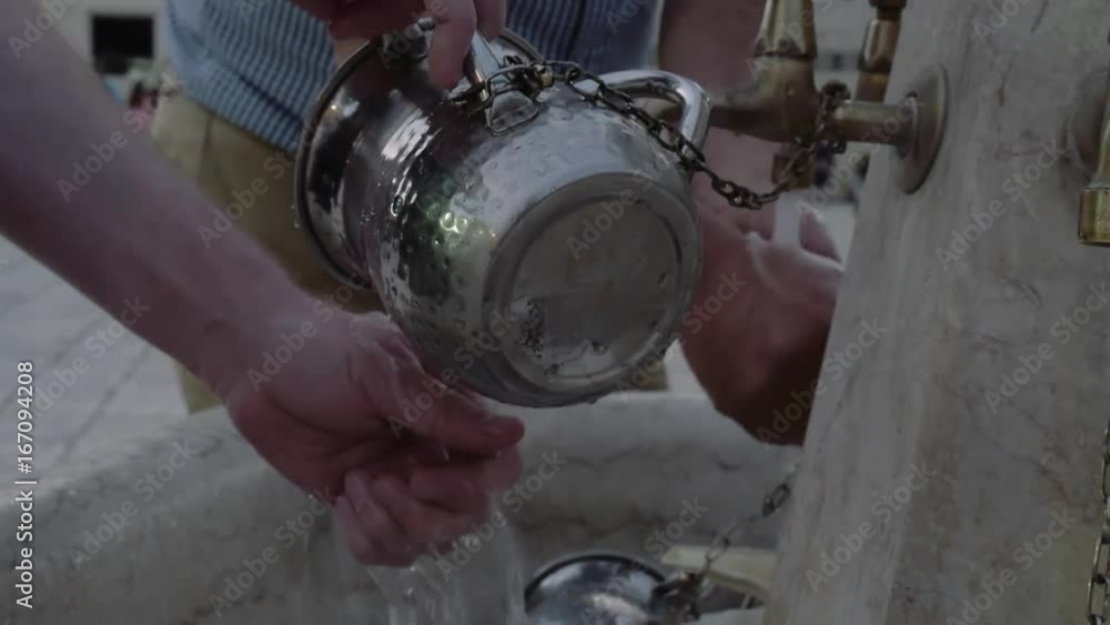 Jewish ritual of handwashing at the Western Wall, Jerusalem. Israel ...