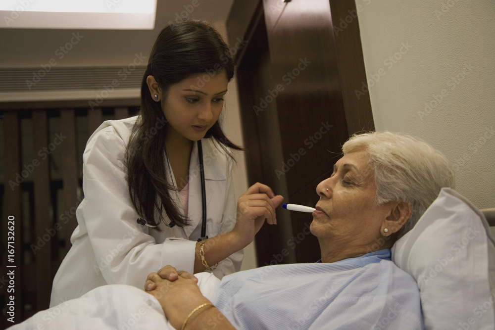 Doctor Taking Temperature