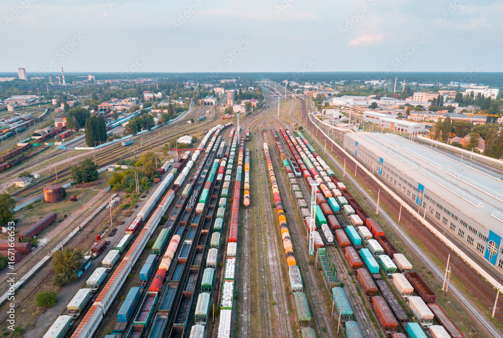 Cargo trains. Aerial view of colorful freight trains. Railway station ...