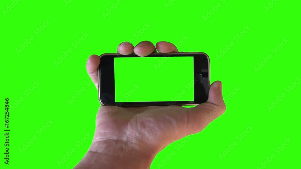 Showing Smartphone For Closer Look, Green Screen Background. Hand ...