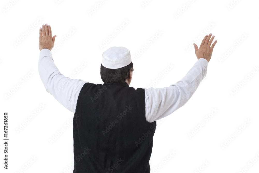 Back view of politician with raised hands Stock Photo | Adobe Stock