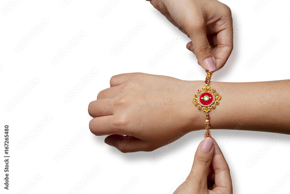 Rakhi on a boy's hand Stock Photo | Adobe Stock