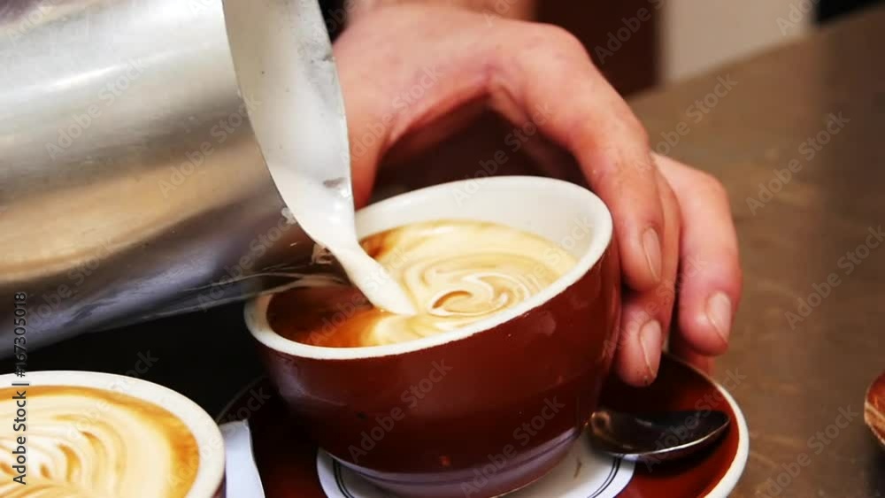 Barista creates latte art, slow motion close up Stock Video | Adobe Stock
