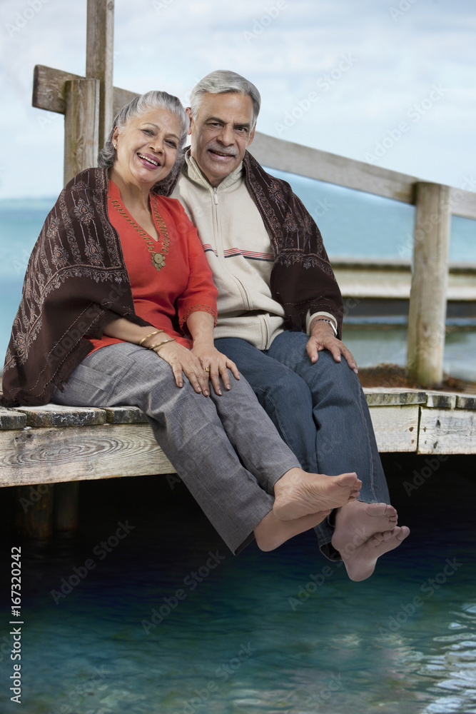 Old couple sitting together Stock Photo | Adobe Stock