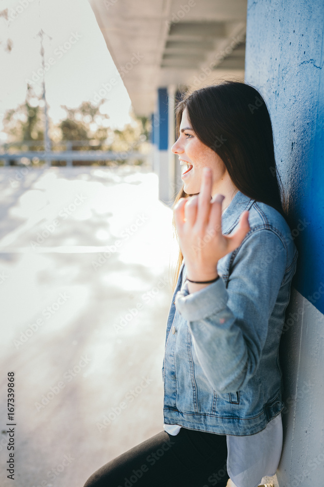 Middle finger, woman portrait Stock Photo | Adobe Stock