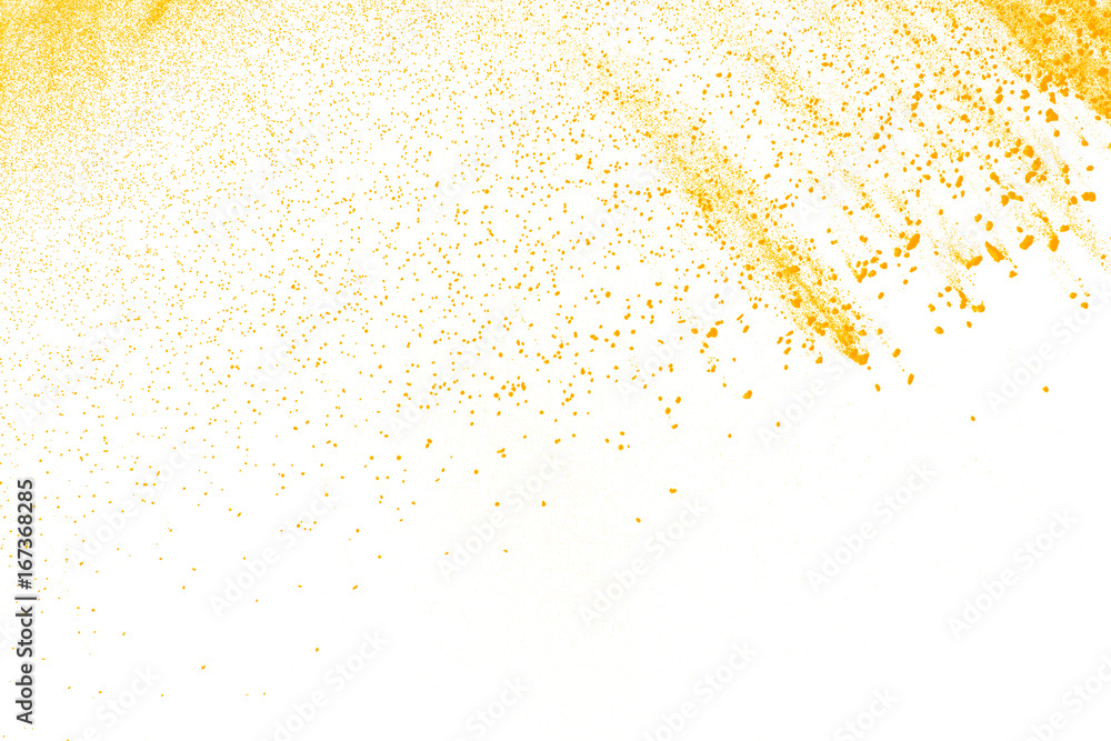 abstract yellow powder splatted on white background,Freeze motion of ...