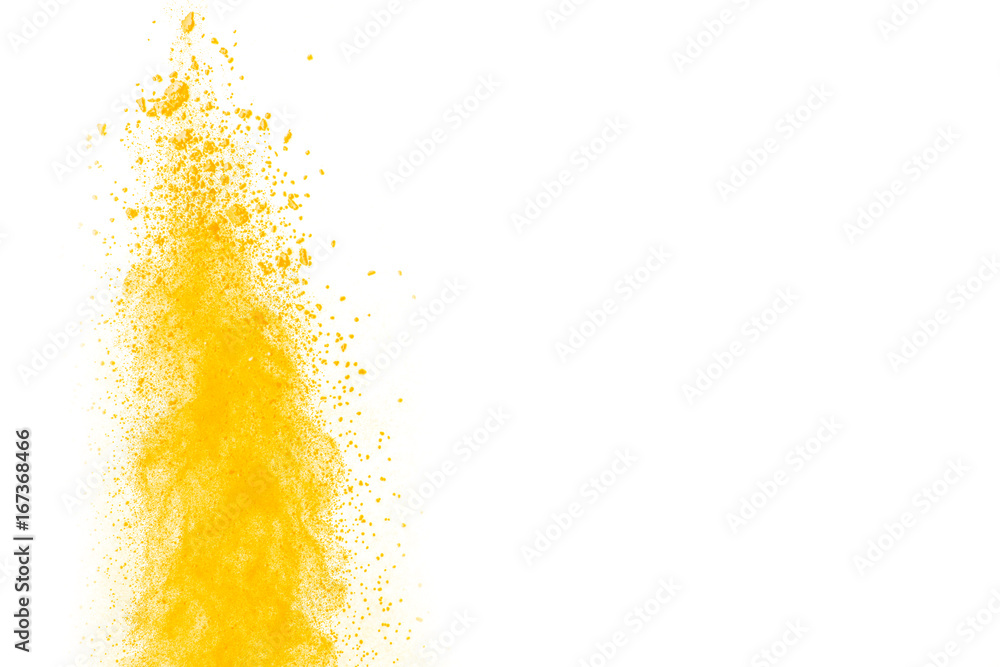 abstract yellow powder splatted on white background,Freeze motion of ...
