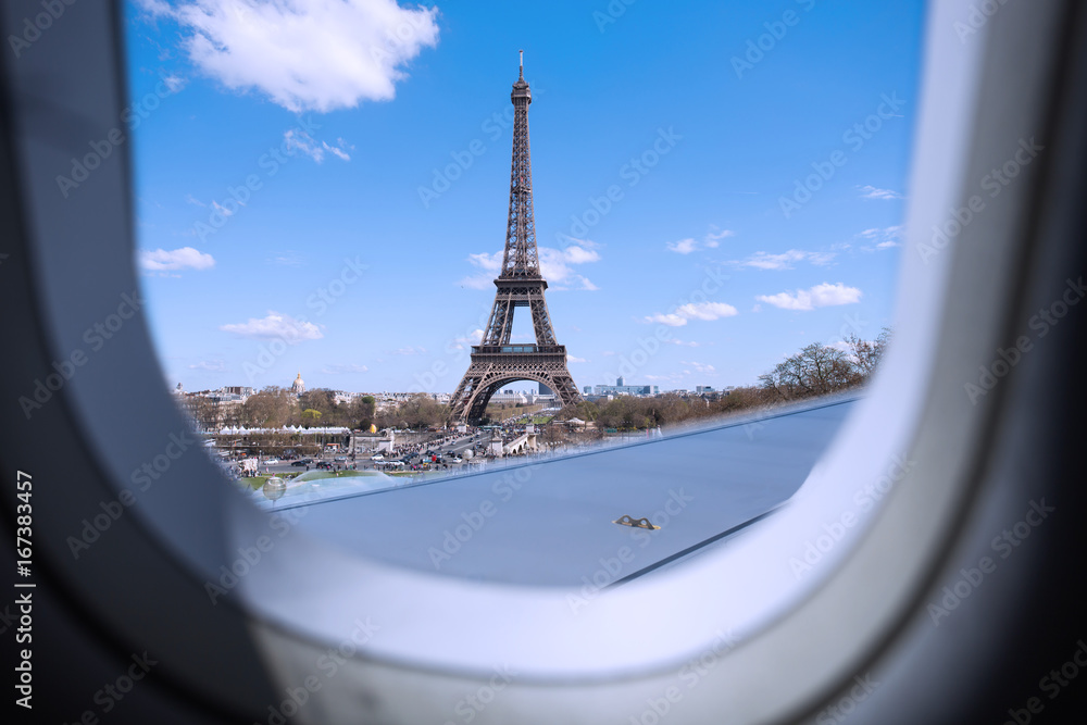 Eiffel as seen through window of an aircraft. Stock Photo | Adobe Stock