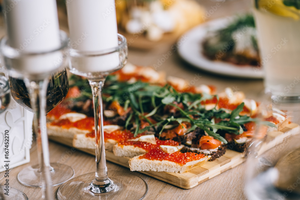 catering services background with snacks and food on plate in ...