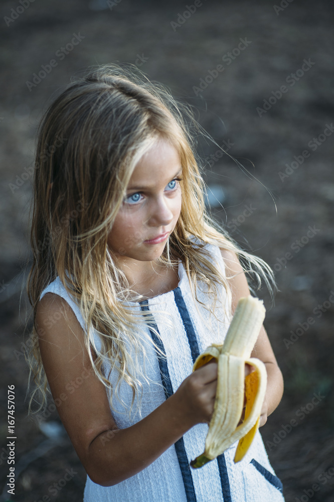Girl Eating Banana