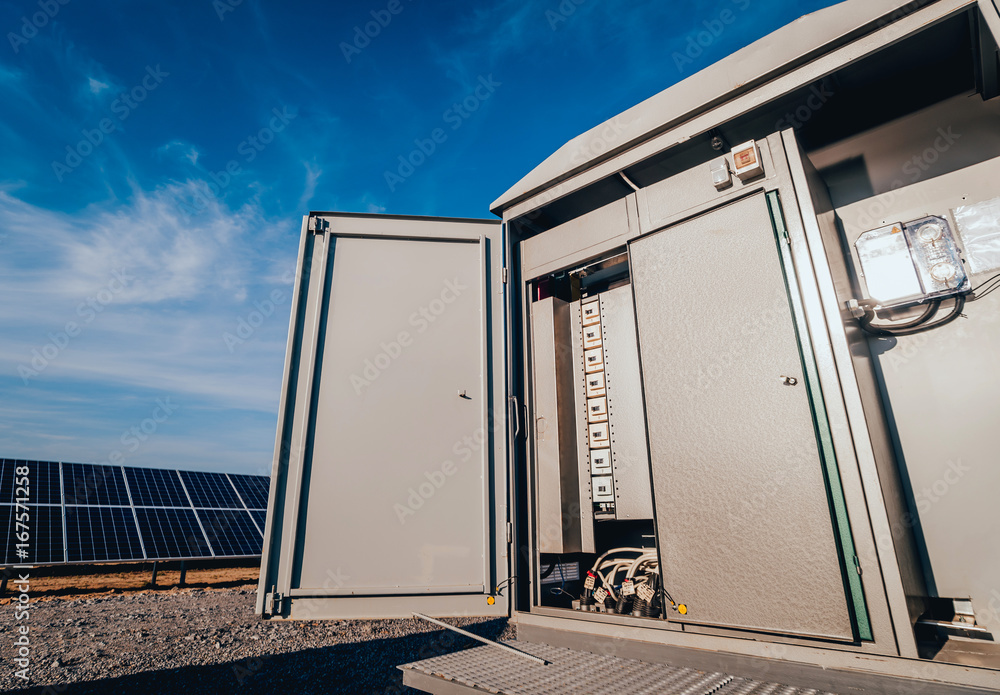 Inverter and store energy building. Solar cell park Stock Photo | Adobe ...