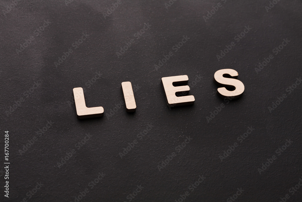Word Lies on black background Stock Photo | Adobe Stock