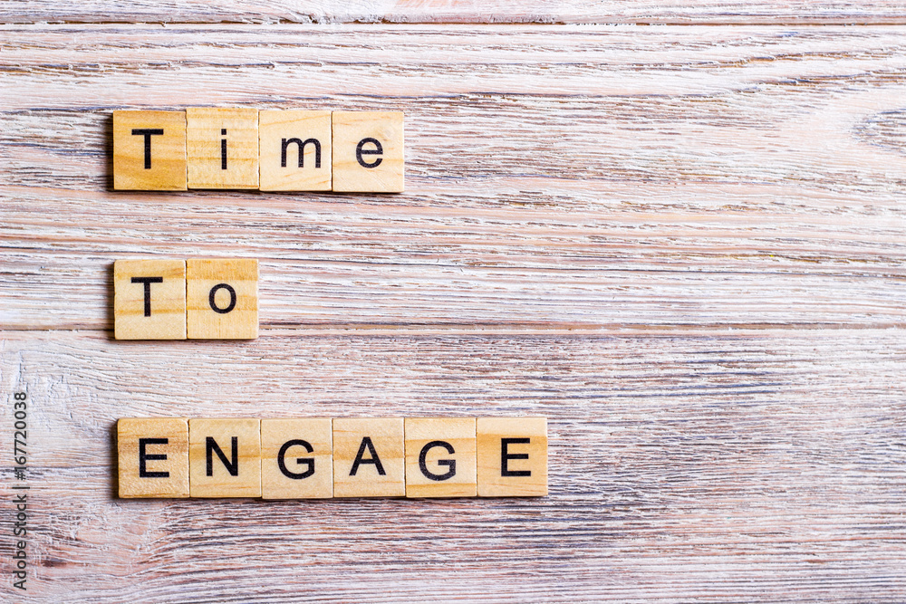 Poster time to engage text on cubes on wooden background – Wall Art ...